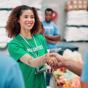 Happy, people and volunteer with handshake for donation agreement ...