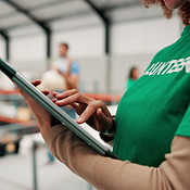 Tablet, woman and hands of volunteer at charity event for online food ...