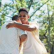 Handshake, men and friends hug in nature for bonding, reunion and ...