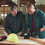 Carpentry, planning and men with documents for woodwork for furniture ...