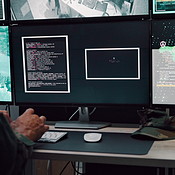 Computer screen, surveillance and typing with soldier in CCTV control ...