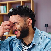 House, pain and man with headache, stress and overworked with burnout ...