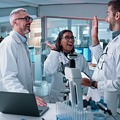 Happy people, scientist and night with high five for discovery ...
