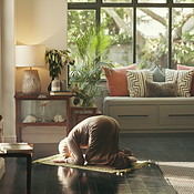 Islamic, religion and woman for praying on mat with bow, spiritual ...