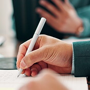 Hands, writing and person with notebook, meeting and secretary with ...