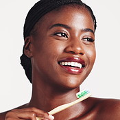 Dental health, happy and black woman brushing teeth in studio for ...