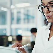 Woman, tablet and developer with pen in office for software development ...