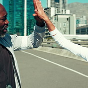 Woman, runner and coach with high five in city for advice, support or ...