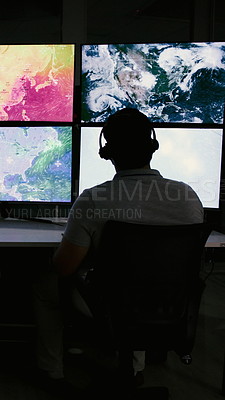 Back, man and screen with satellite in control room to monitor weather ...