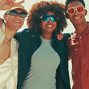 Happy, hug and friends at beach with photo for memory on holiday ...