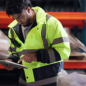 Checklist, logistics and tablet with man in plant for delivery ...