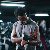 Gym, shoulder pain and man with dumbbell, fitness and bodybuilder with ...